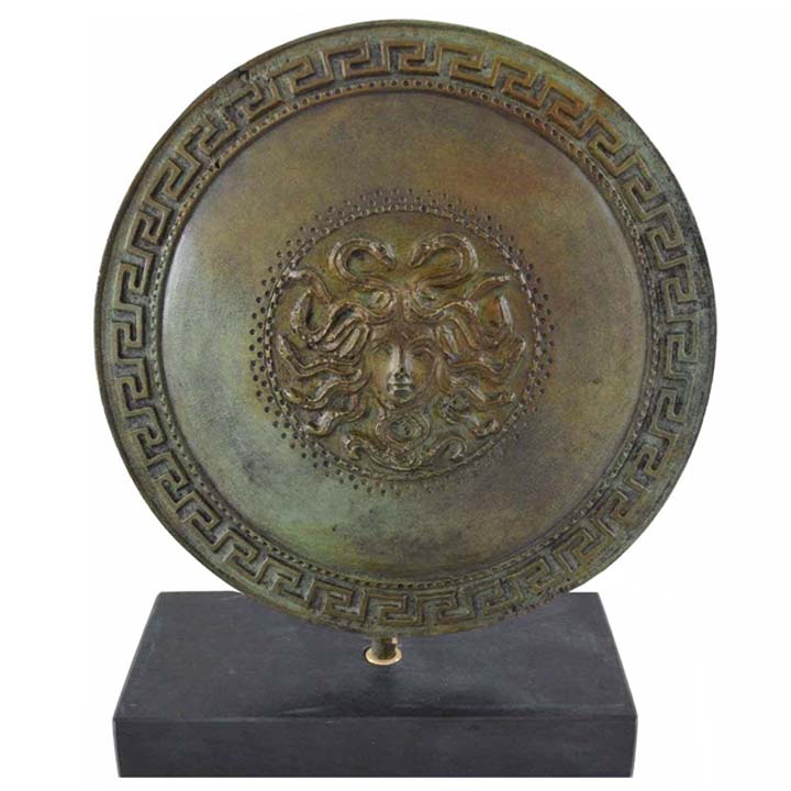 Ancient Greek small bronze shield with Gorgon Medusa head and meander ...